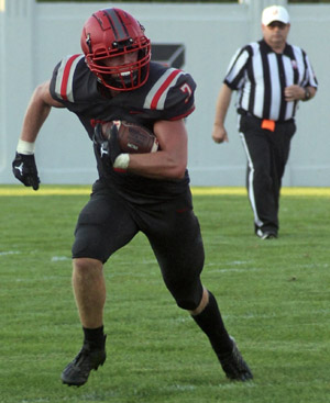 Cougars roar, beat Bryan 63-28 in opener « The VW independent